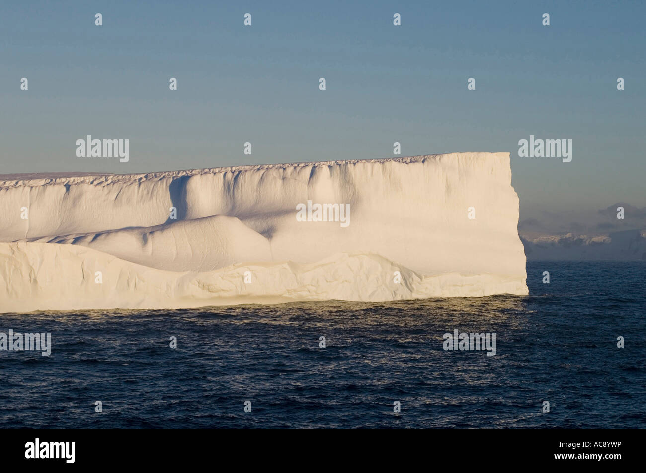 Iceberg floating on water Stock Photo - Alamy