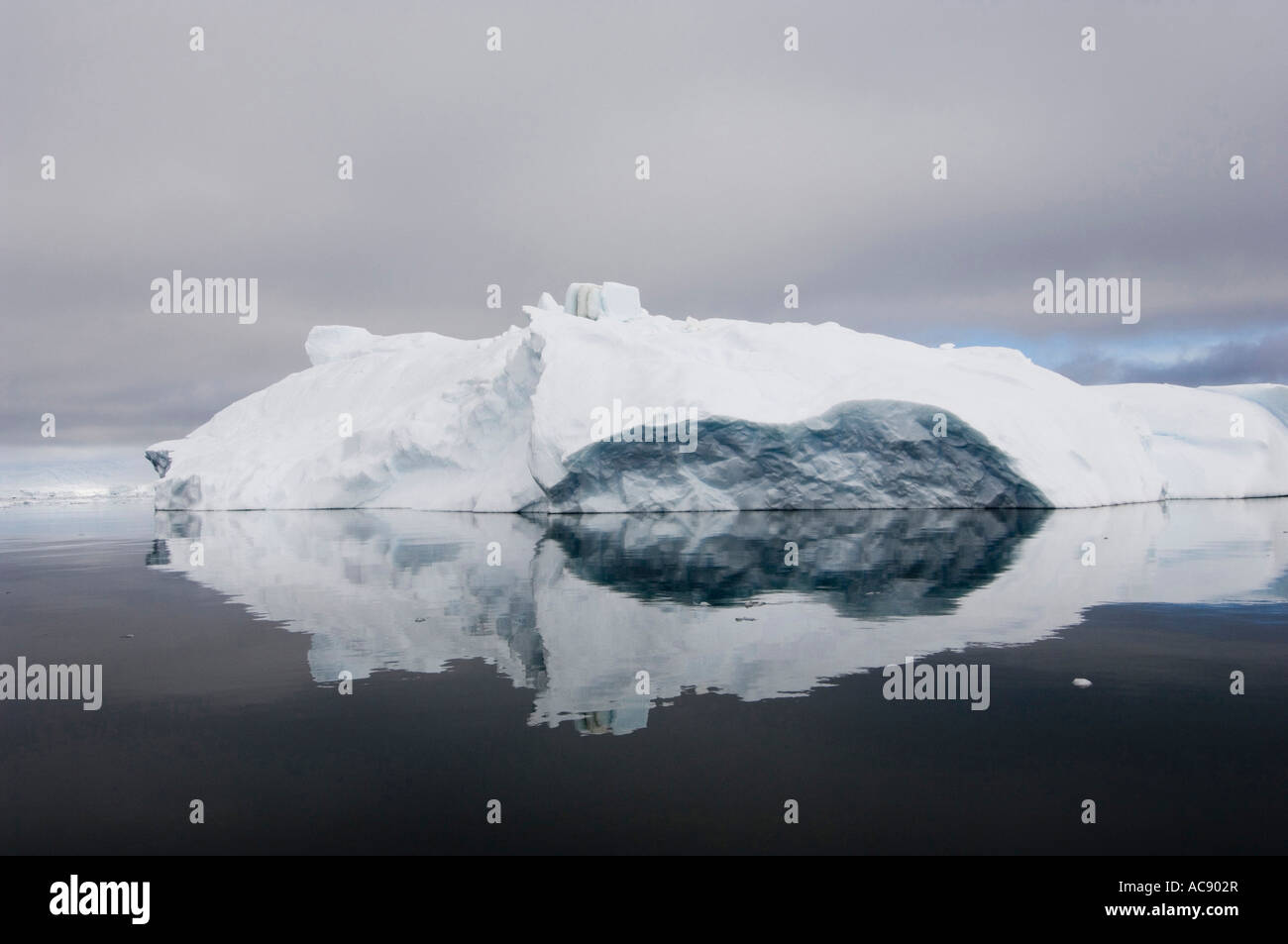 Reflection of an iceberg in water Stock Photo - Alamy