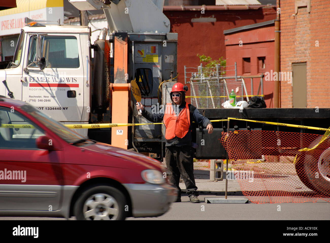 Directing traffic, stop sign Stock Photo - Alamy