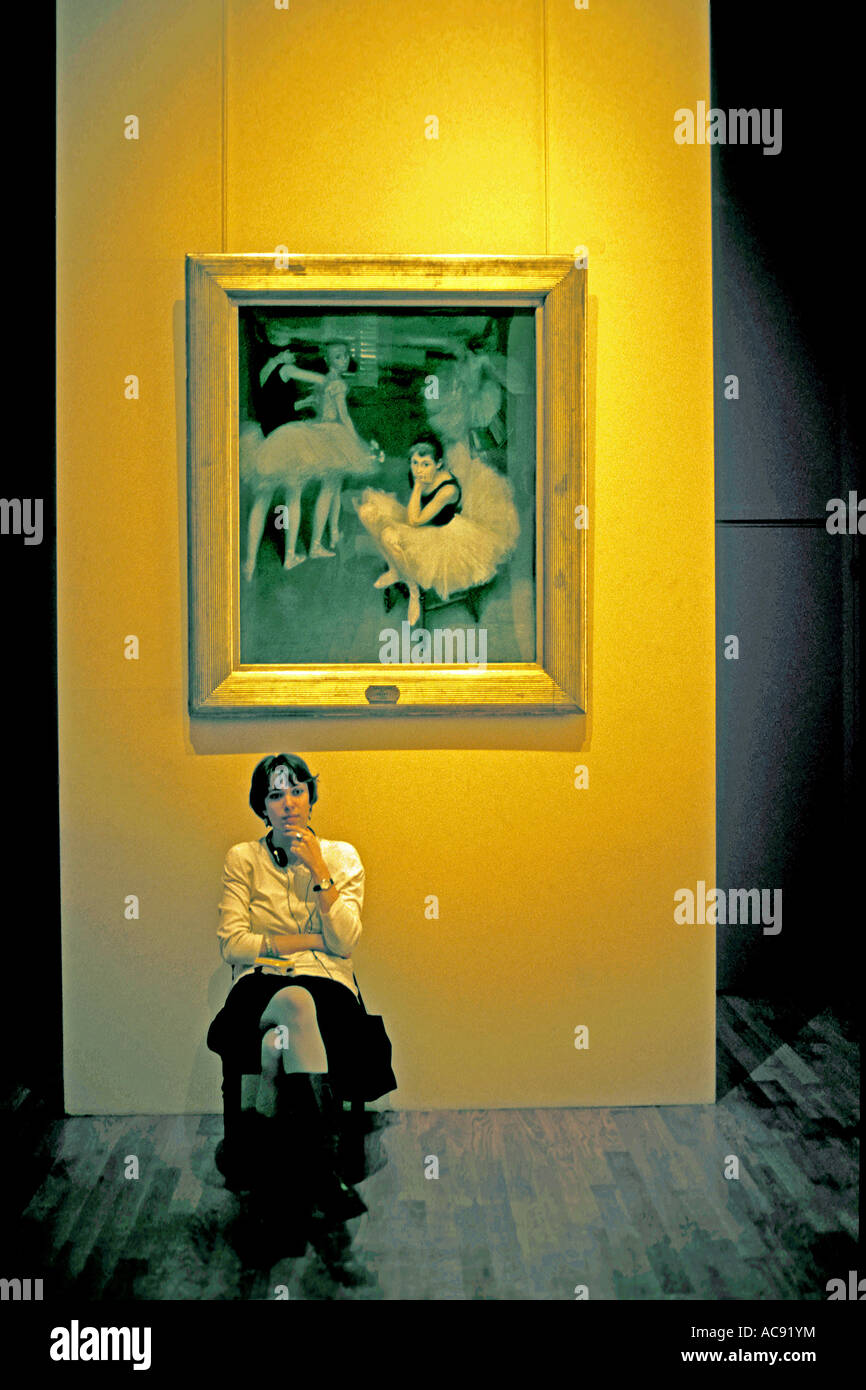 Europe France Paris a woman reflects the body language of a Degas ...