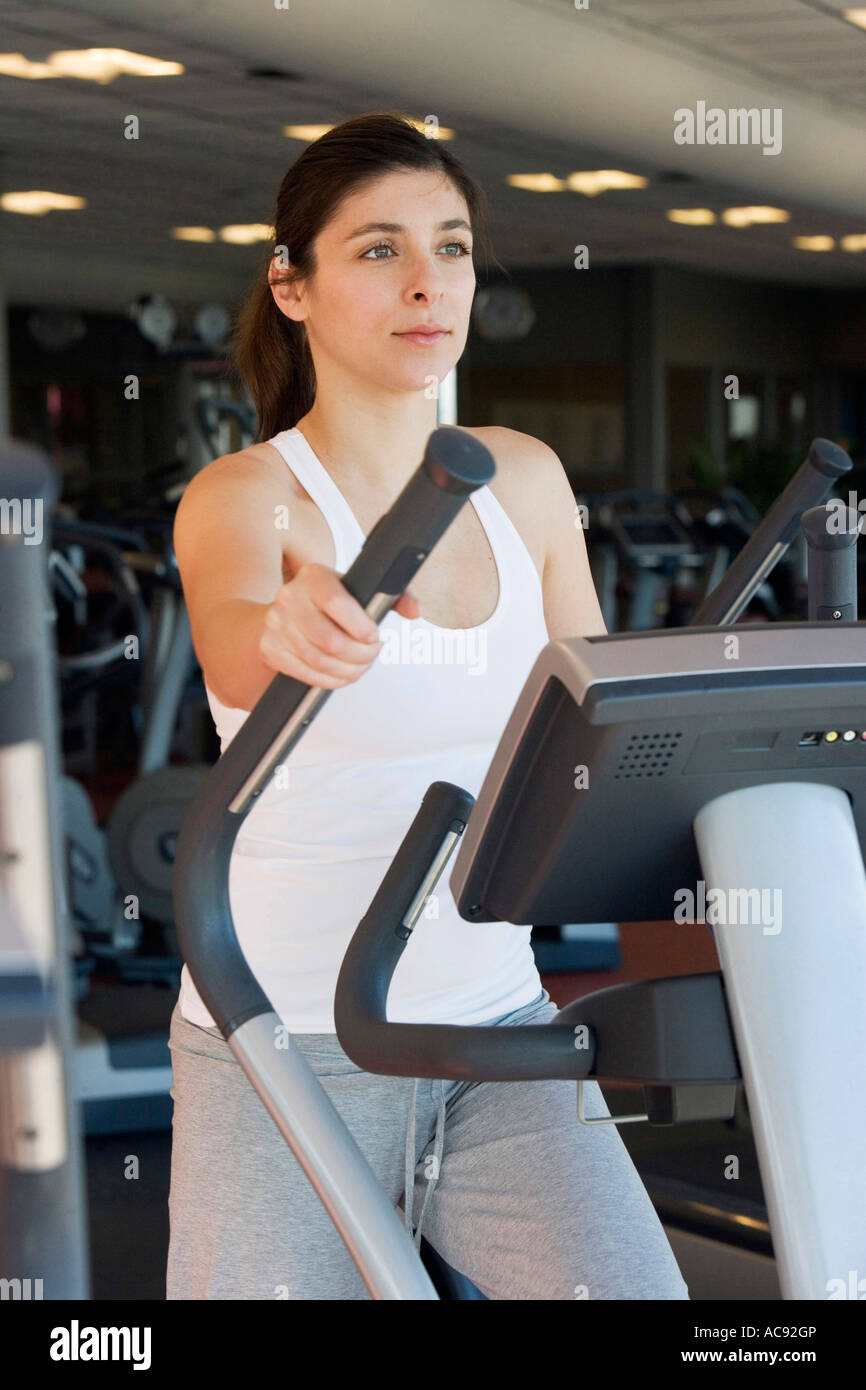 Mid adult woman exercising Stock Photo - Alamy