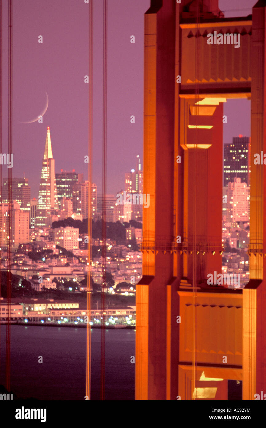Golden Gate Bridge with crescent moon over San Francisco skyline in ...