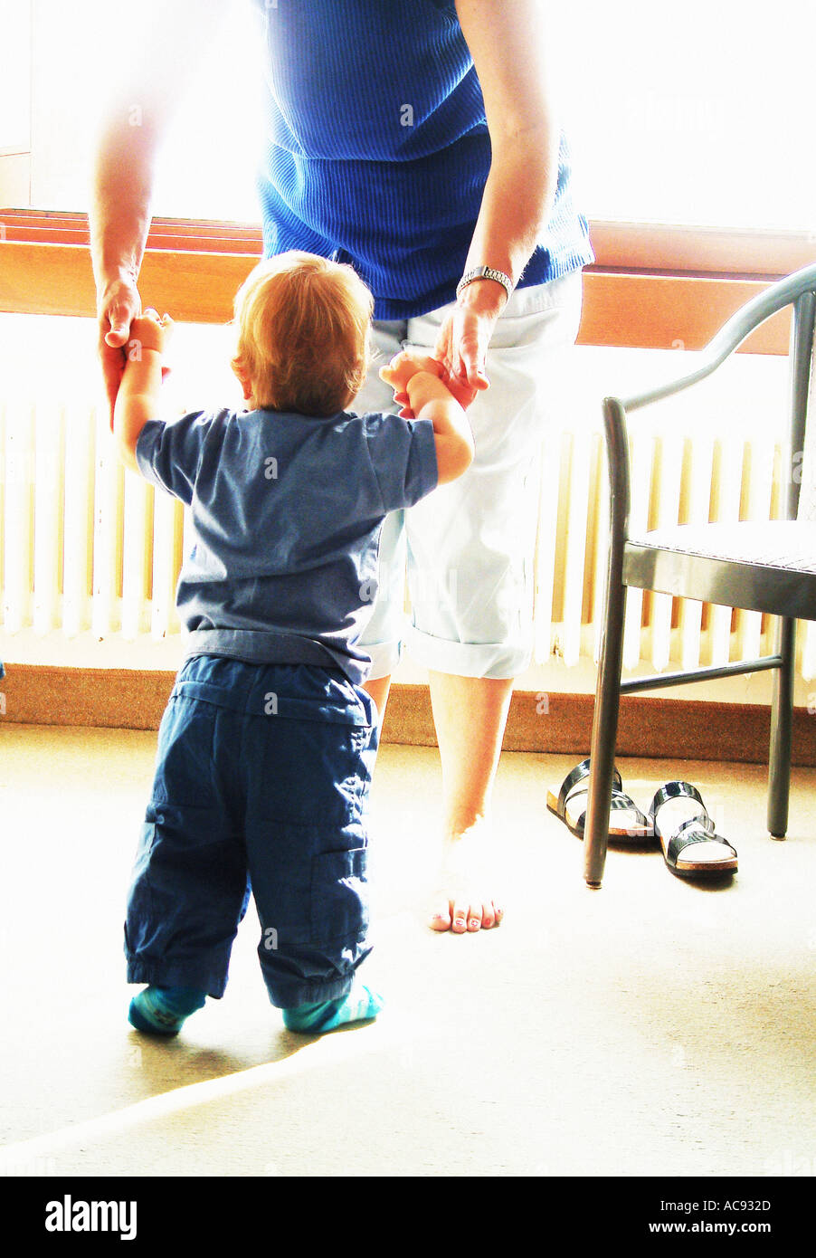 Mom is the first teacher hi-res stock photography and images - Alamy