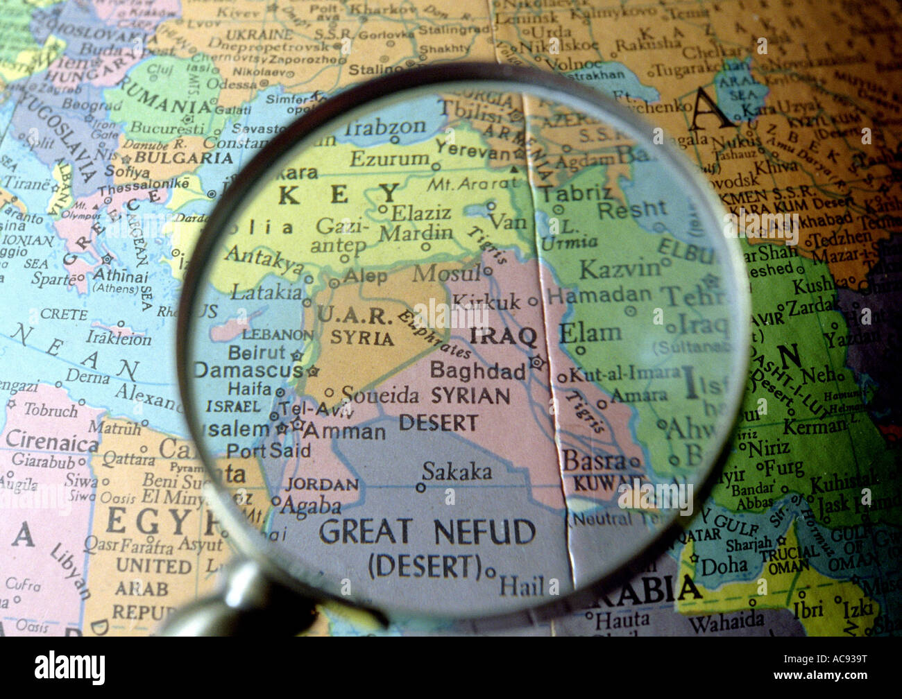 Close-up of a world map viewed through a magnifying glass Stock Photo ...