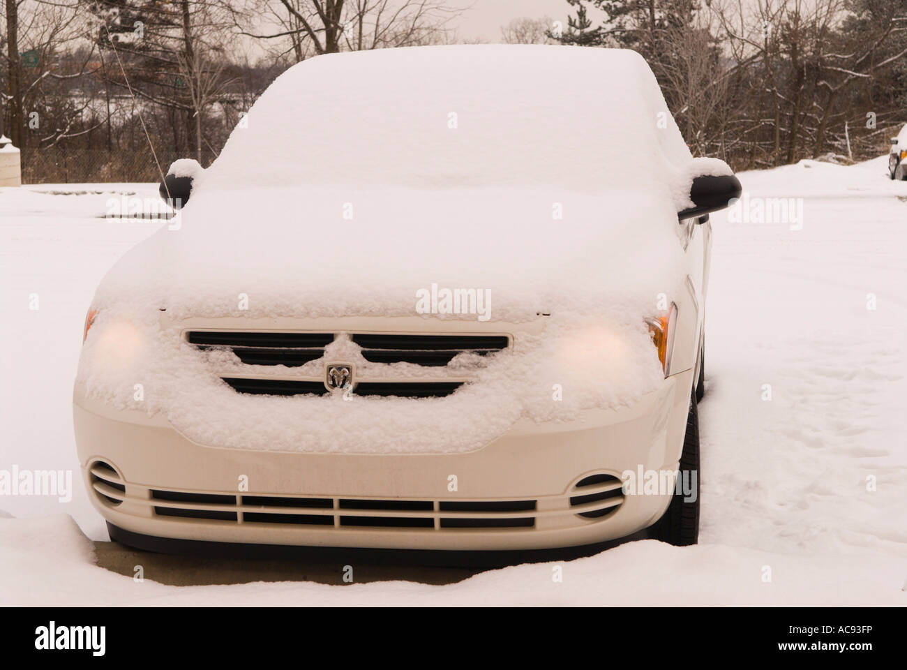 Snowfall in parking lot car park Ann Arbor Michigan USA Stock Photo - Alamy