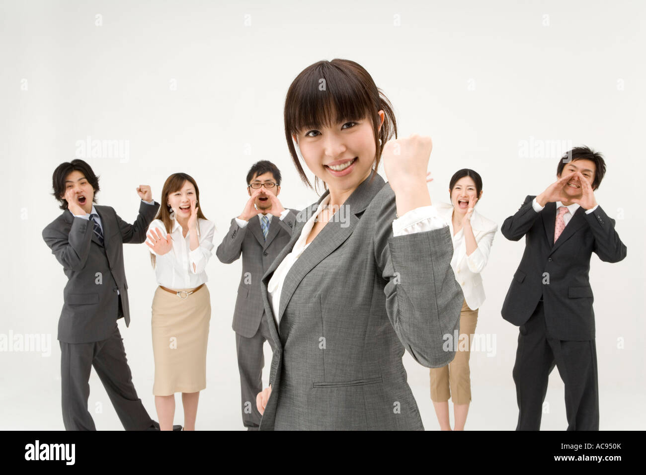Business people cheering Stock Photo - Alamy