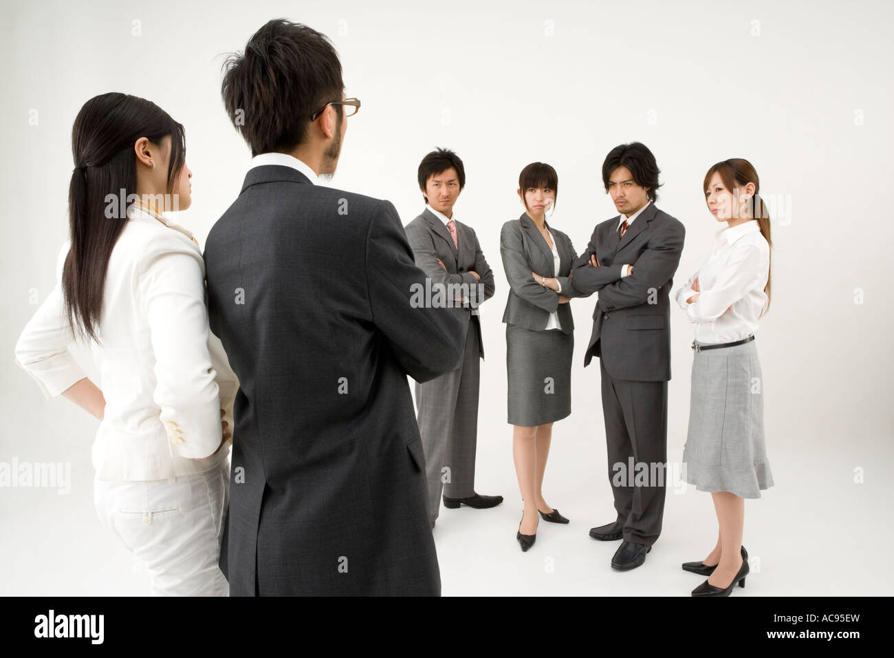 Staring At Each Other Arms Crossed High Resolution Stock Photography ...