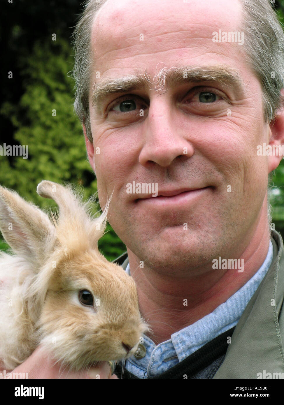 Rabbit in your arms hi-res stock photography and images - Alamy