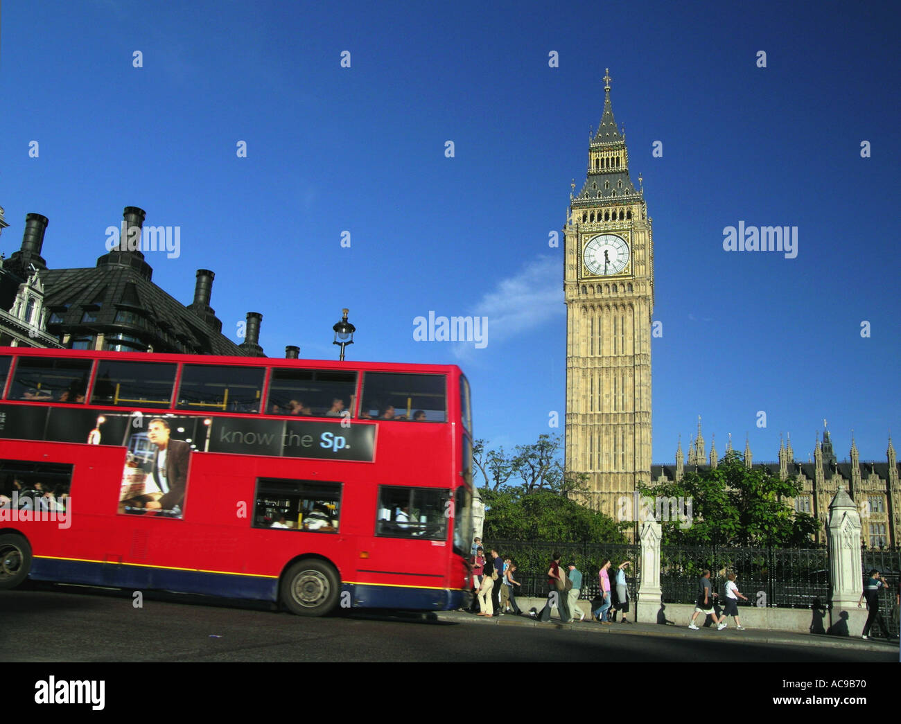 London Big Ben Parliament and red bus England UK Britain day Stock ...