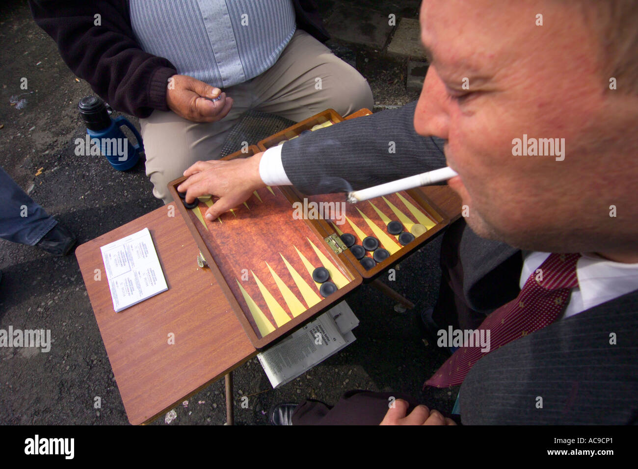 men playing backgammon Stock Photo - Alamy