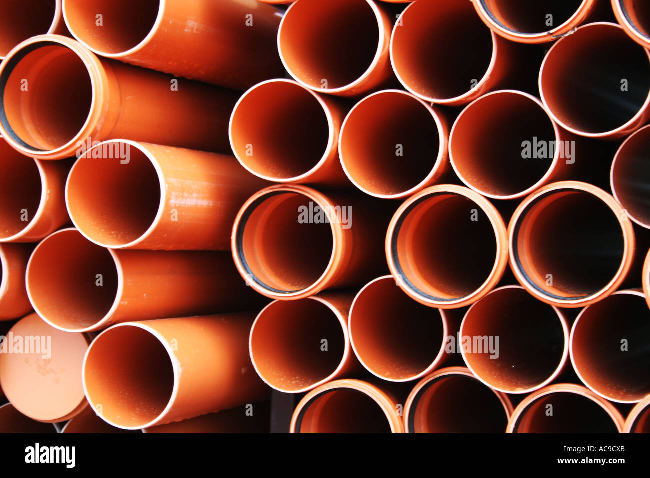 Stack of industrial PVC pipes Stock Photo - Alamy