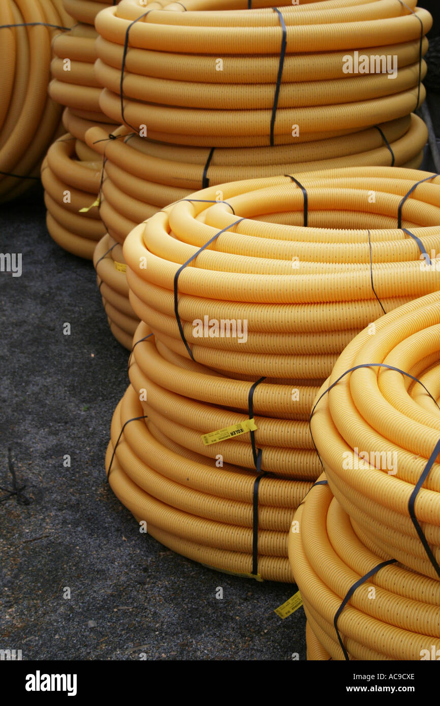 Rolls of plastic pipes hi-res stock photography and images - Alamy