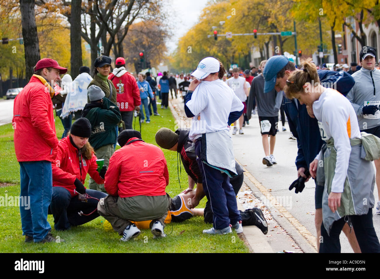 marathon race runners injured Stock Photo - Alamy