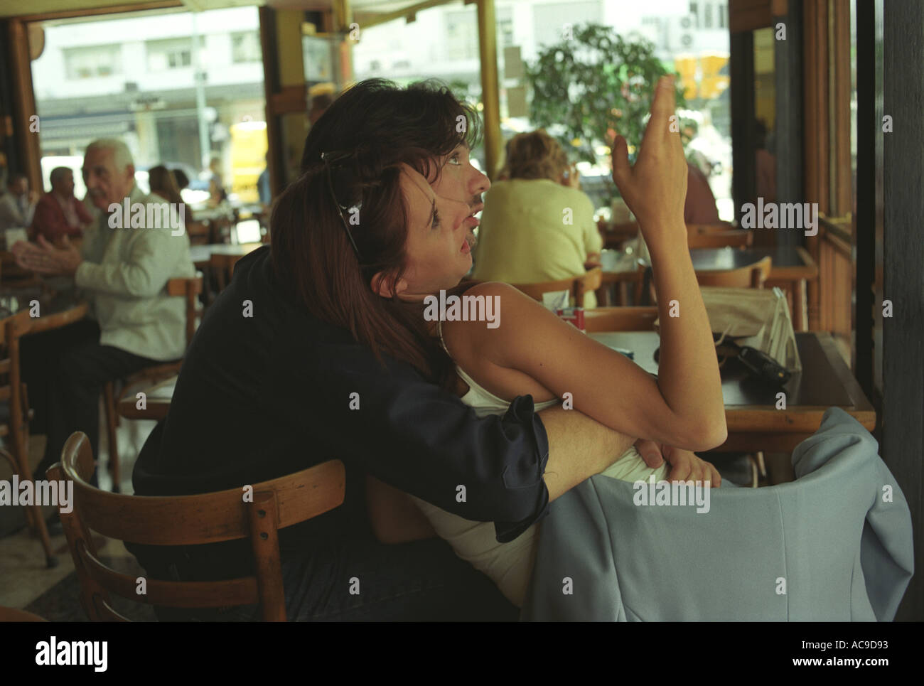 Young lovers in lunch time cafe Buenos Aires Argentina South America ...
