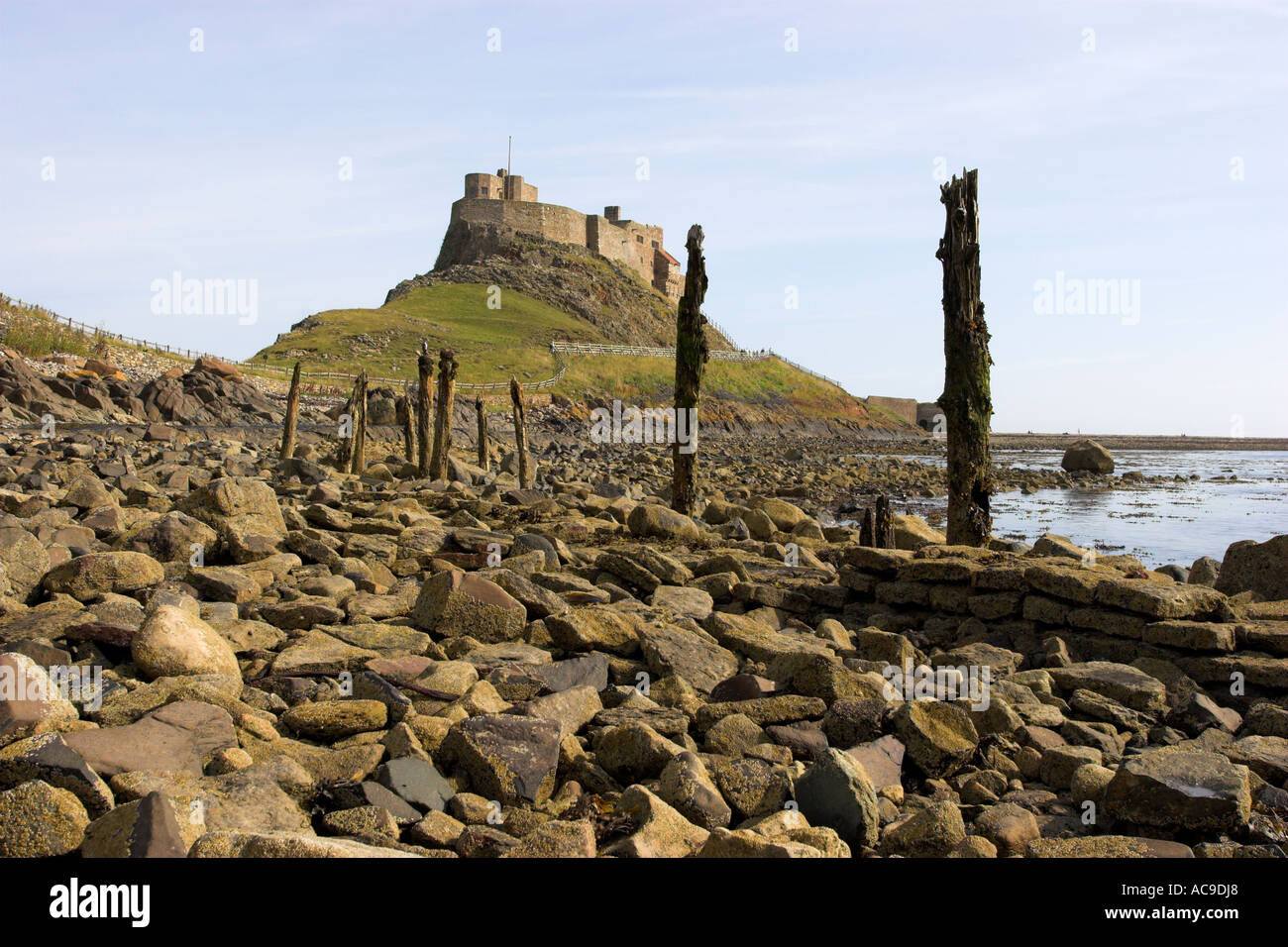 Low tide with Lindisfarne Castle in the distance. Holy Island ...