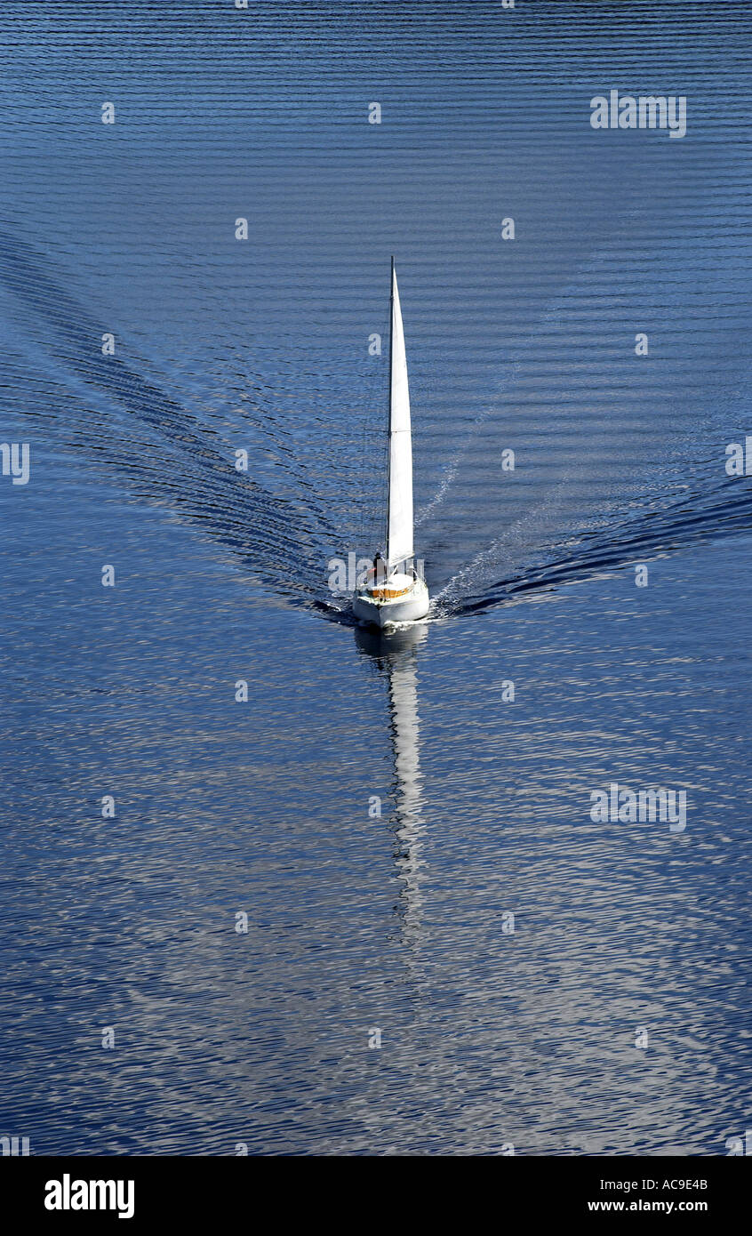 Yacht sailing down the river with aq perfect bow wave. photo by Bruce ...