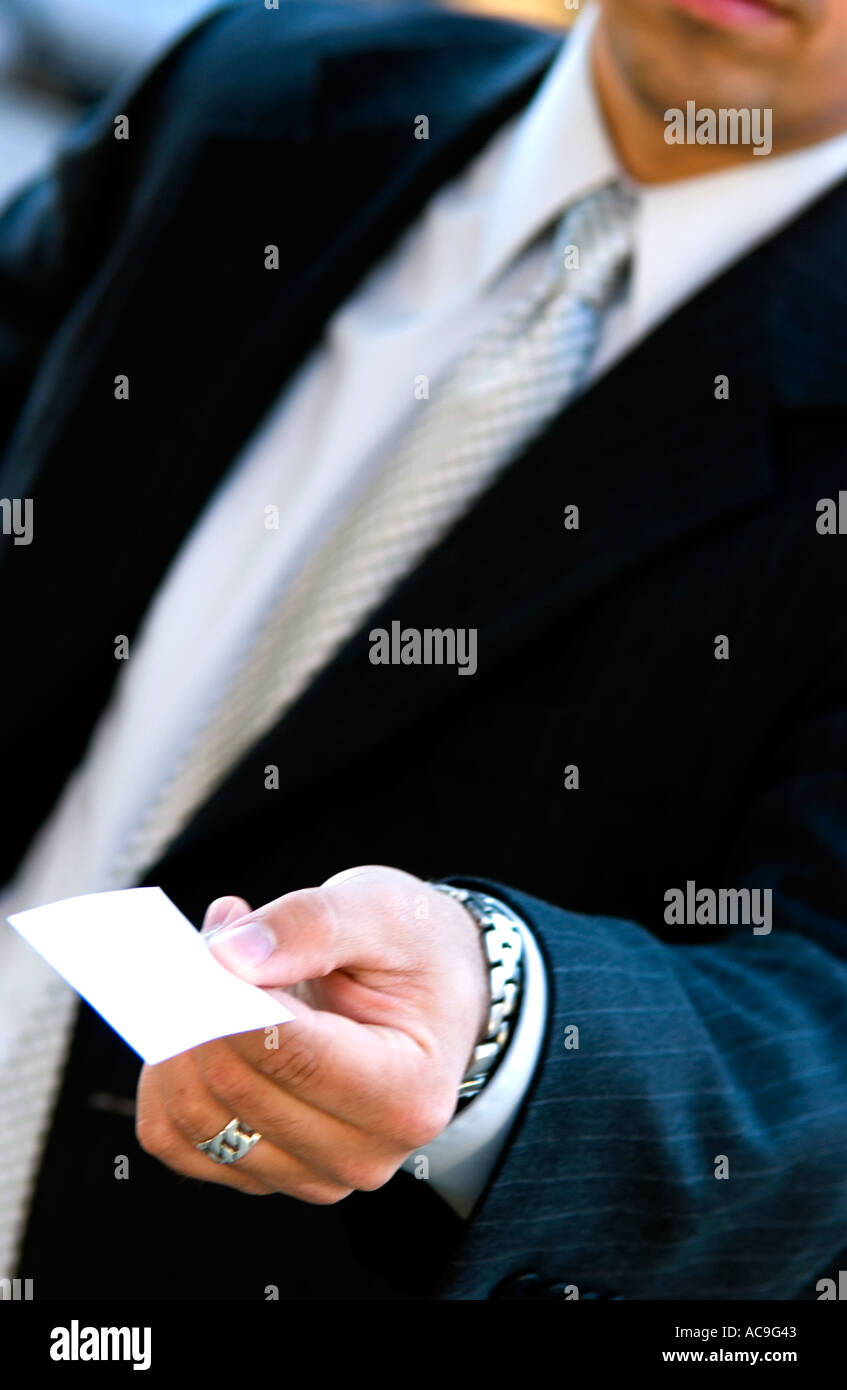 Handing out business card hi-res stock photography and images - Alamy