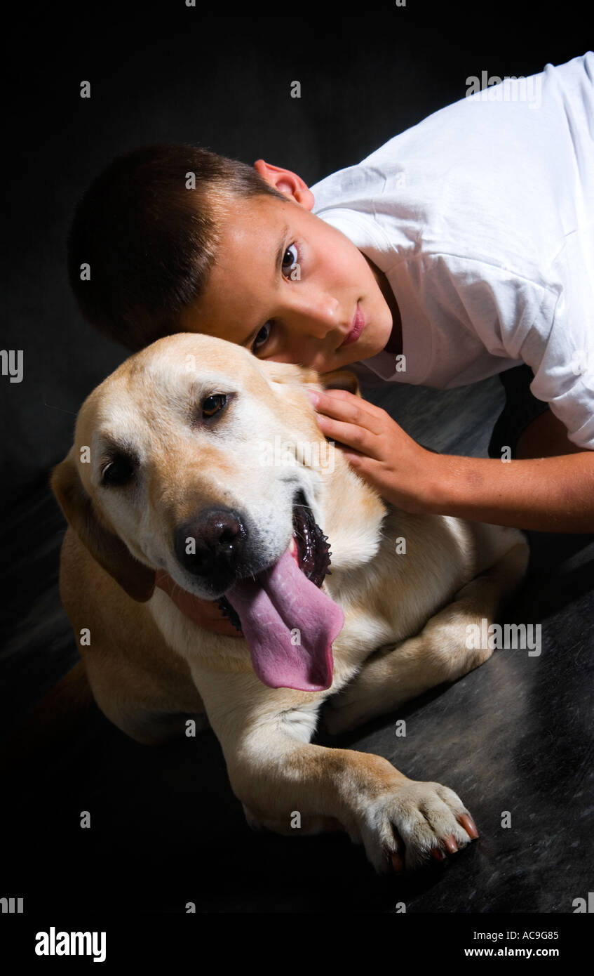 Boy with dog Stock Photo - Alamy