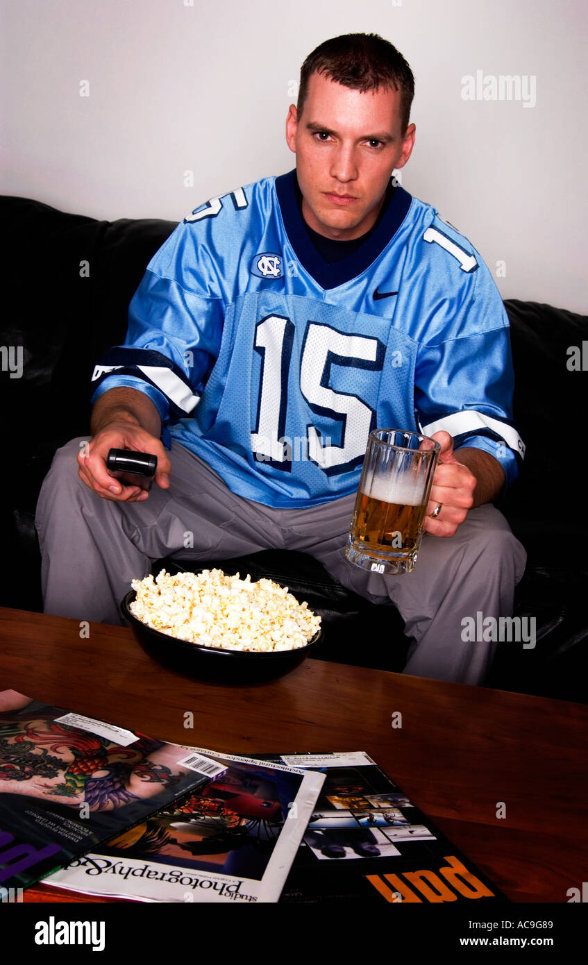 Man watching tv Stock Photo - Alamy