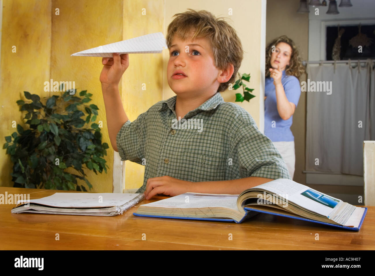 Mom supervising child homework hi-res stock photography and images - Alamy