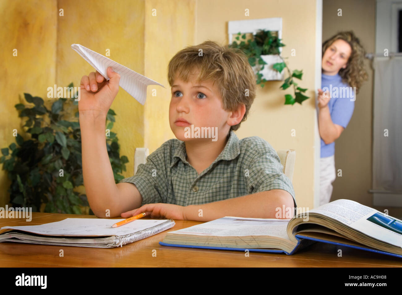 Mom supervising child homework hi-res stock photography and images - Alamy
