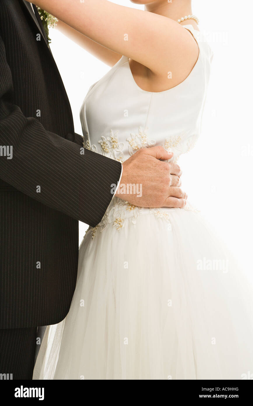 Close up of bride and groom dancing Stock Photo - Alamy