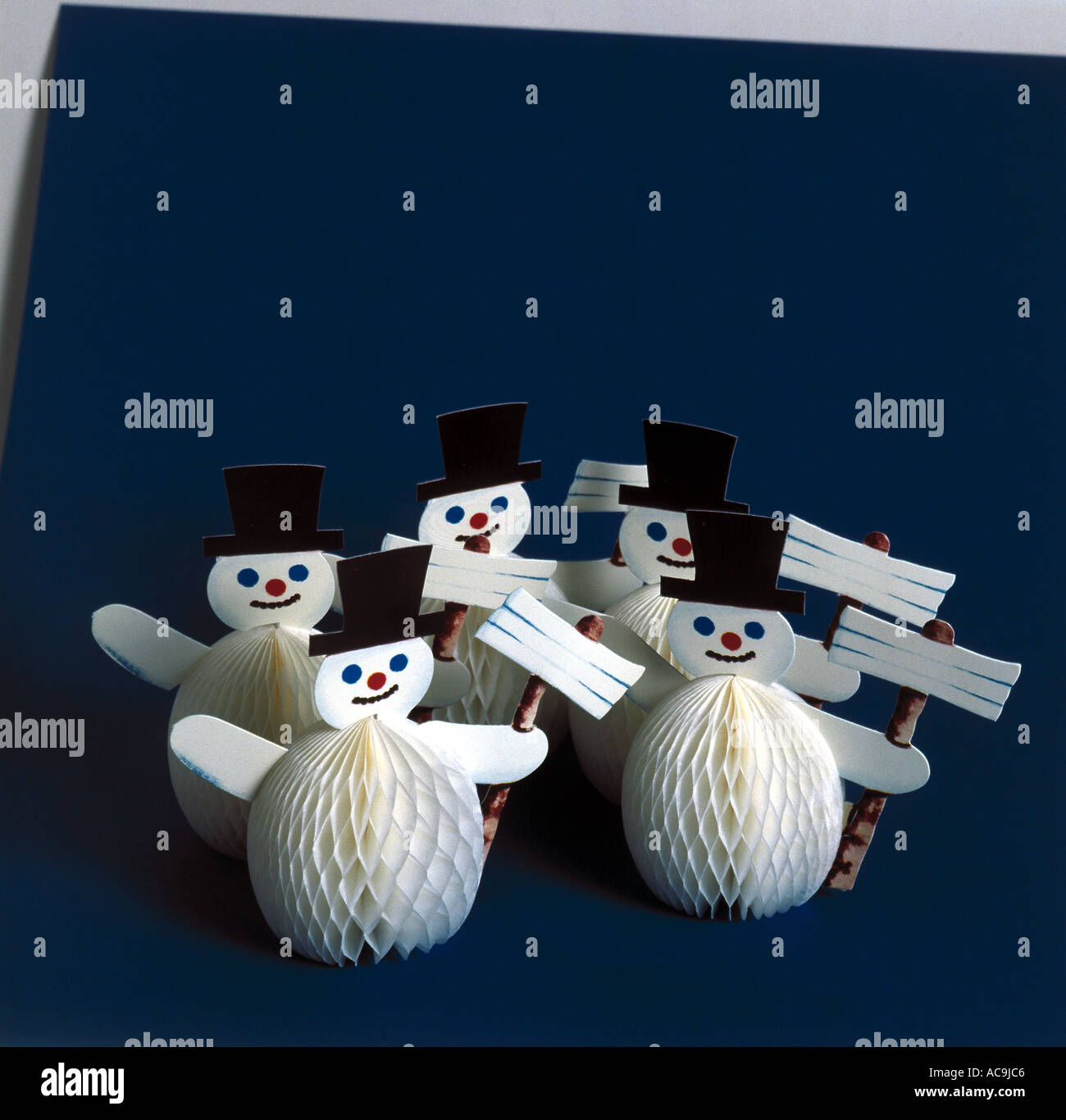 Paper snowmen decorations Stock Photo - Alamy