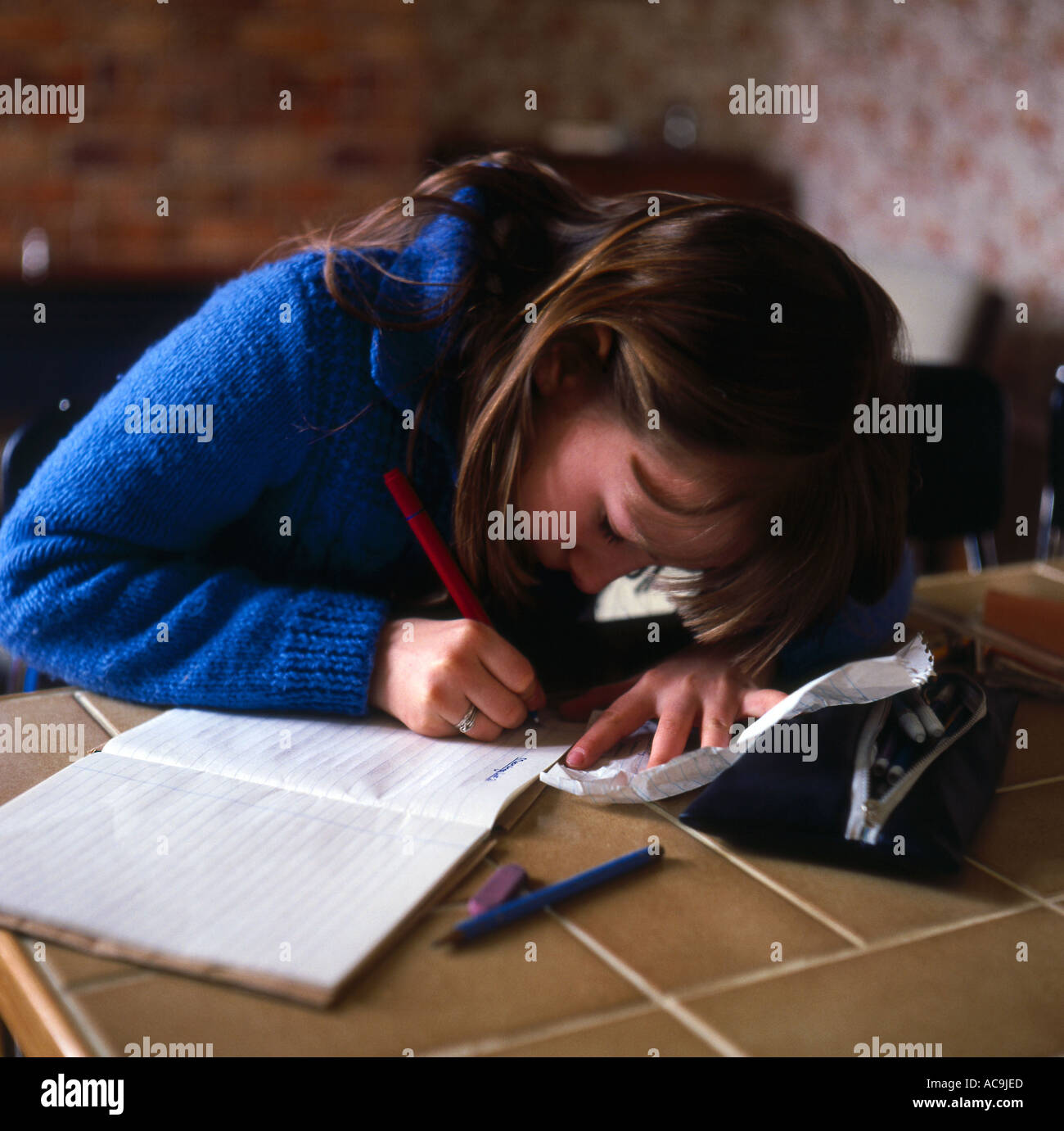 Doing her homework hi-res stock photography and images - Alamy