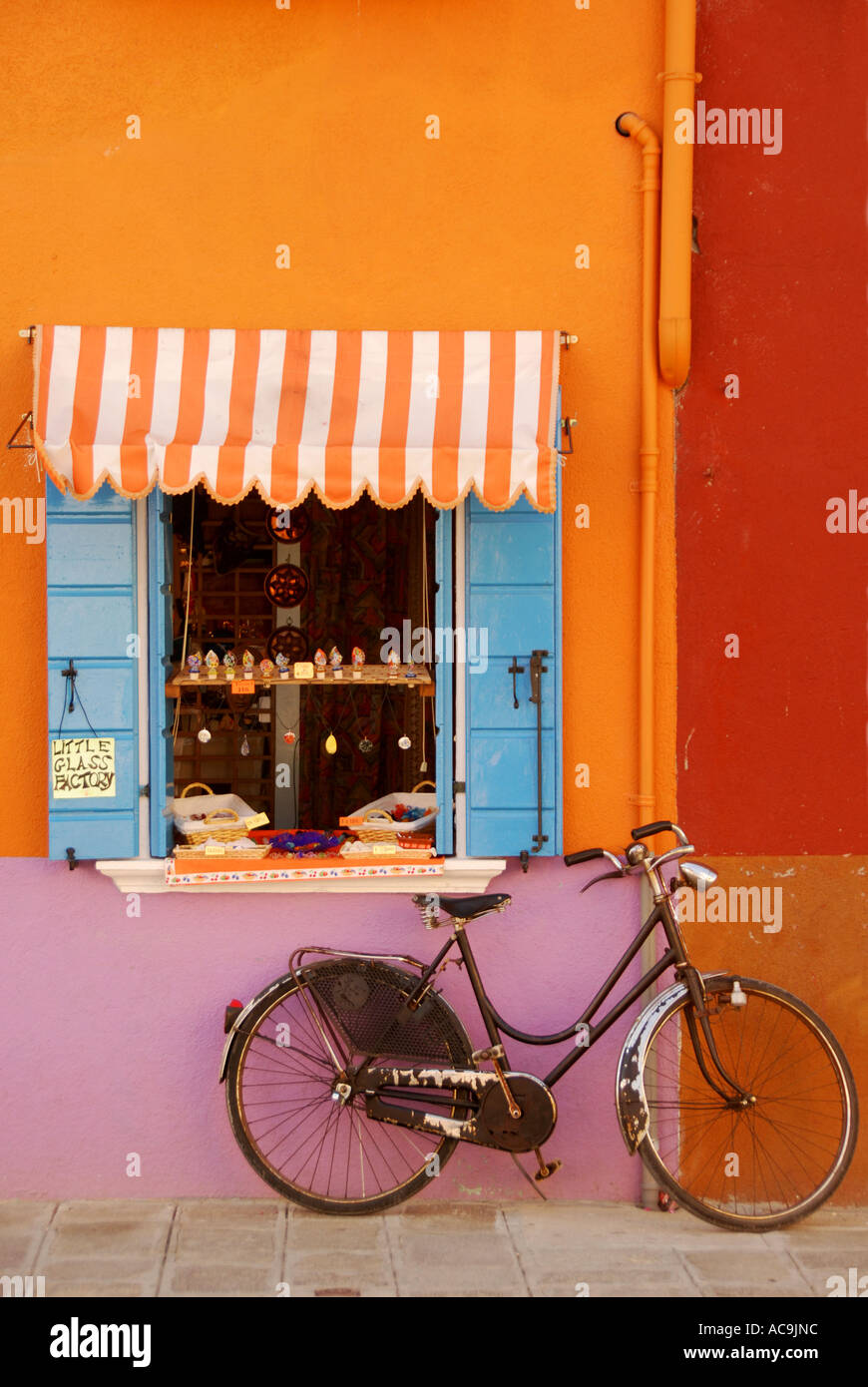 Bike outside shop window Burano a small beautiful island close to ...