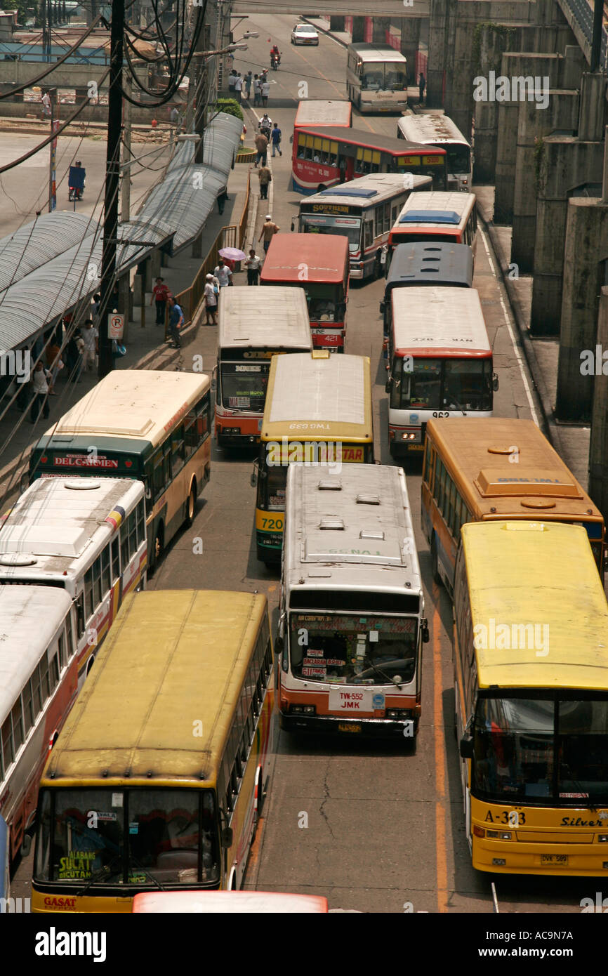 Buses stopping on EDSA Manila Stock Photo - Alamy