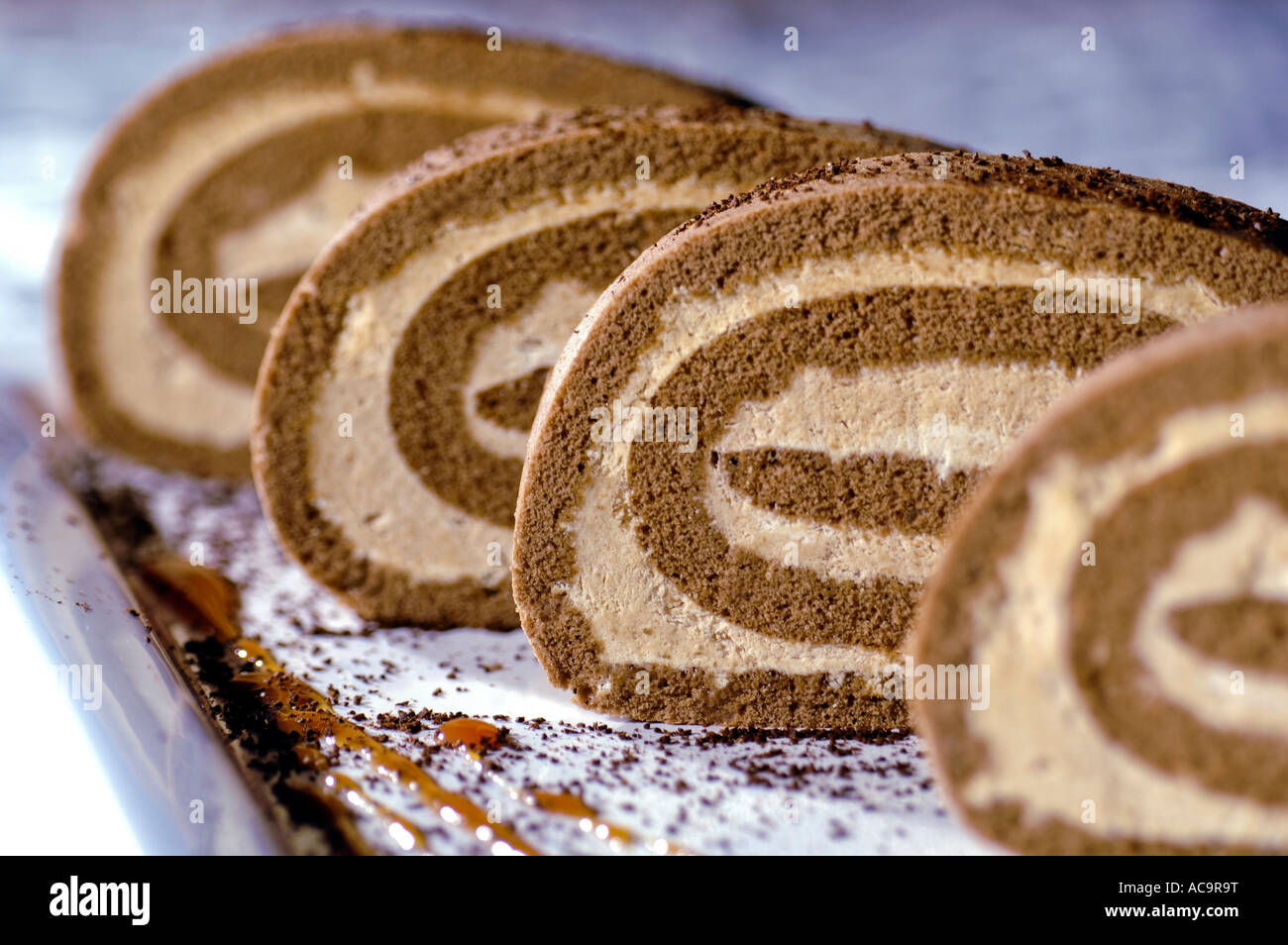 Chocolate sponge roll cake Stock Photo - Alamy