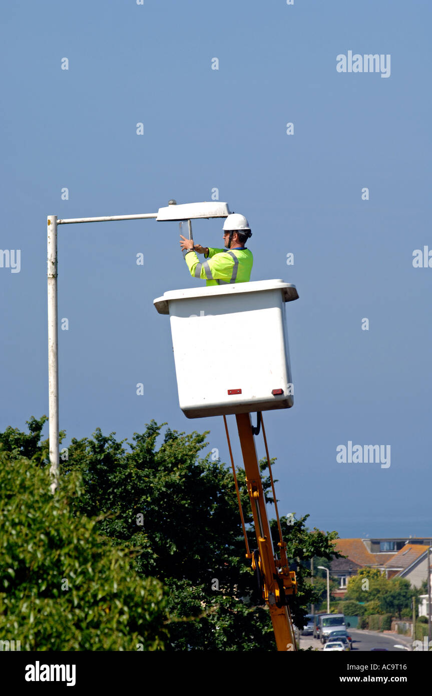 Electrical repair man at work Stock Photo - Alamy