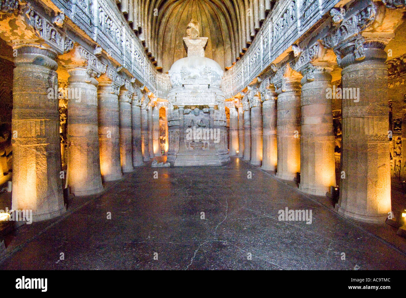 The exquisitly carved ceiling and pillars inside cave 26 at Ajanta ...