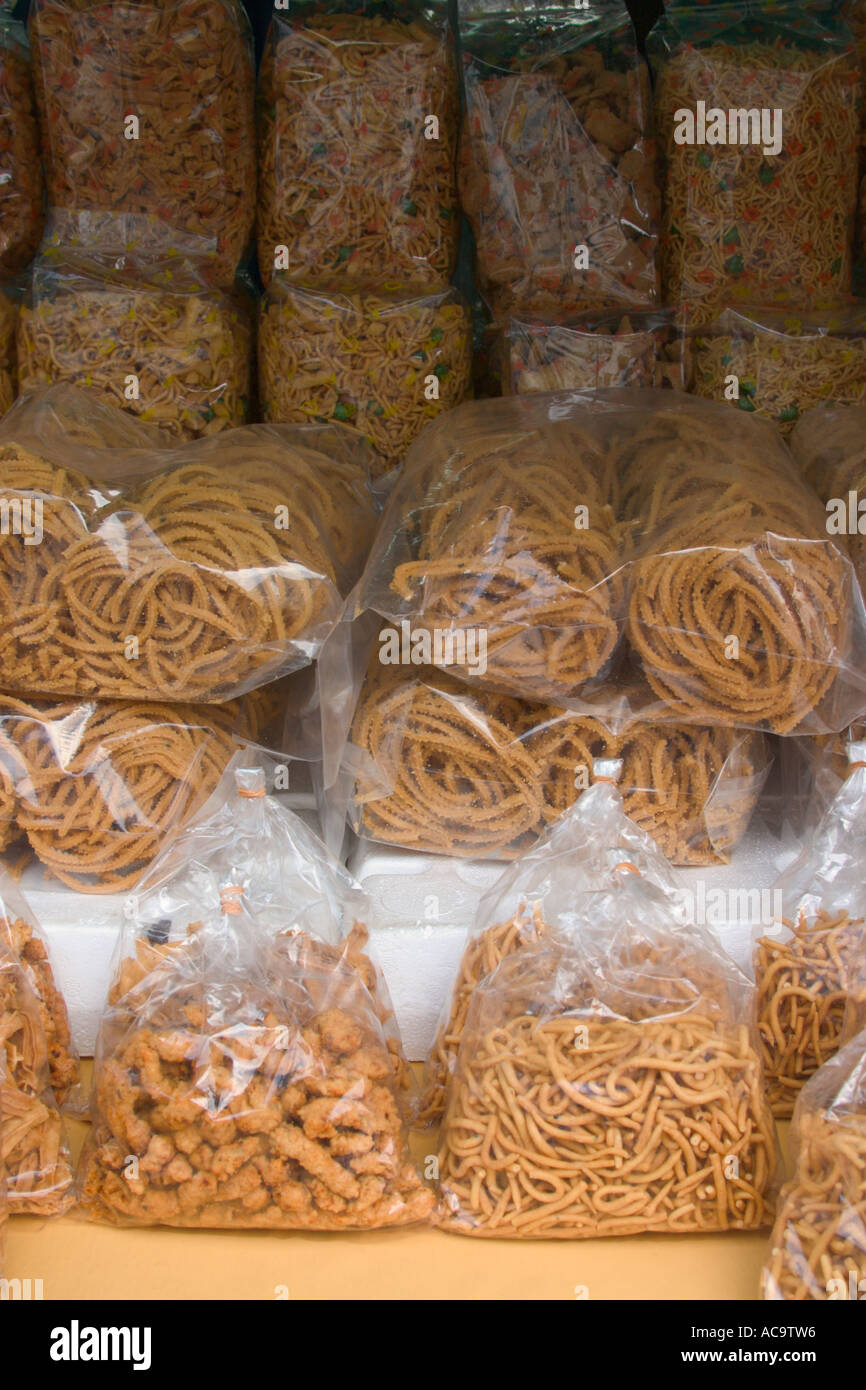 packets of indian crunchy snacks on sale Stock Photo - Alamy