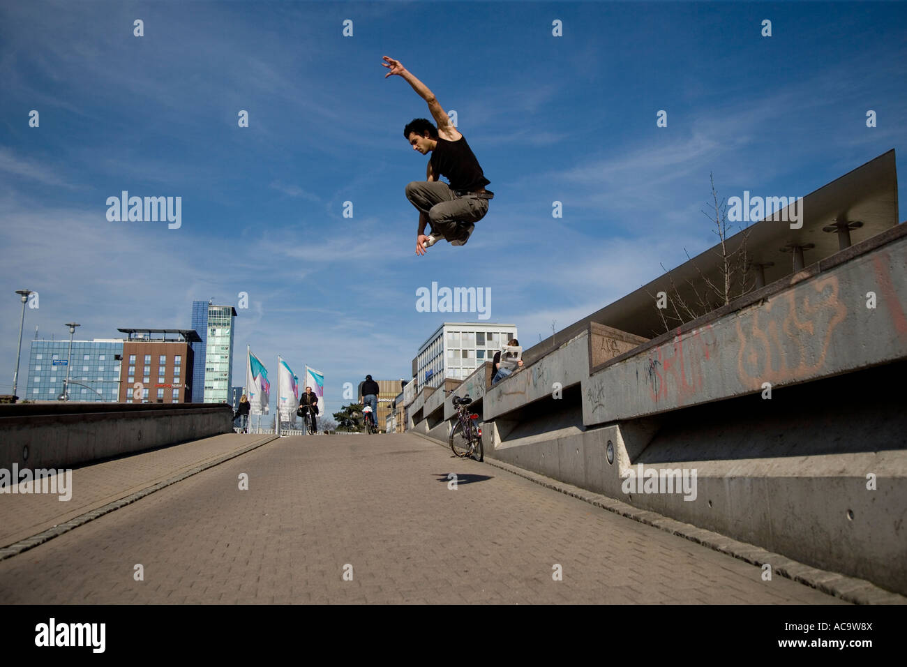 Young Parcours Specialist Doing Somersault In The Air Stock Photo Alamy