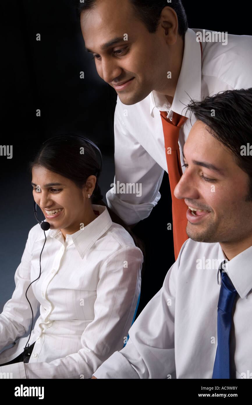 Indian businessteam at a business meeting smiling Stock Photo - Alamy