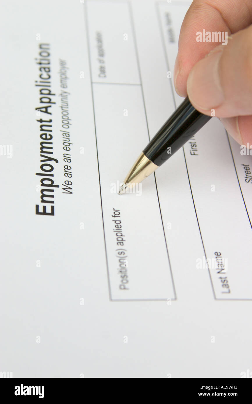 pen filling up employment application form Stock Photo - Alamy