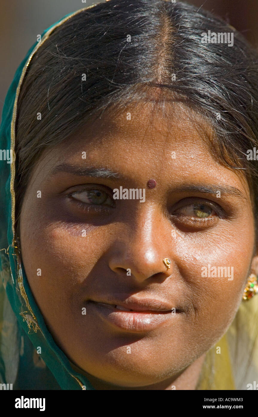 A Close Up Portrait Of A Young Attractive Indian Woman Wearing A Stock