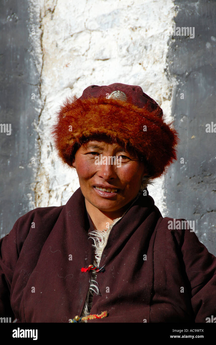 Portrait Tibetan woman wears fur cap and coat Tidrum Nunnery Monastery ...