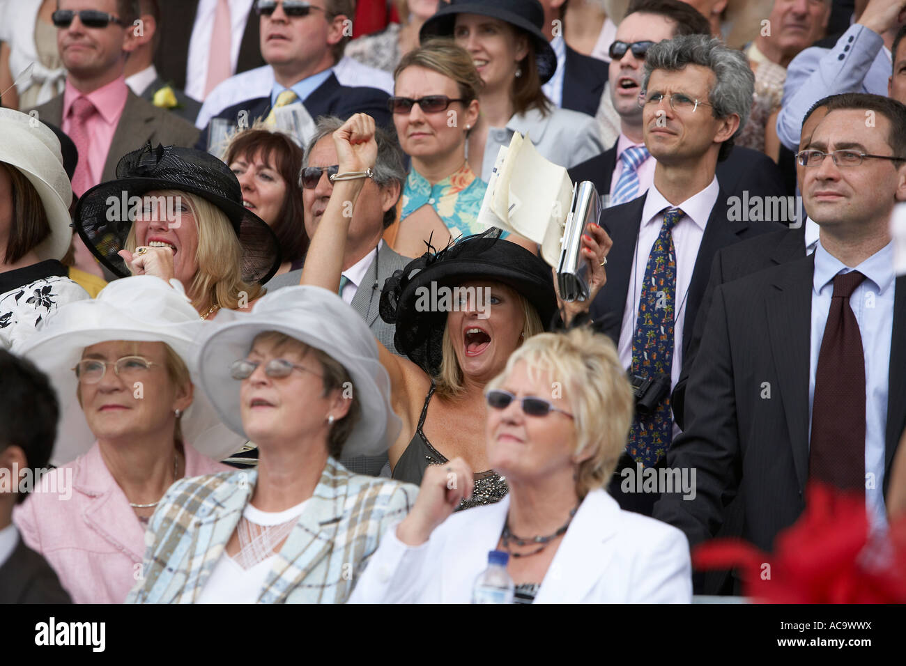Girls having fun at Royal Ascot backing winners Stock Photo - Alamy