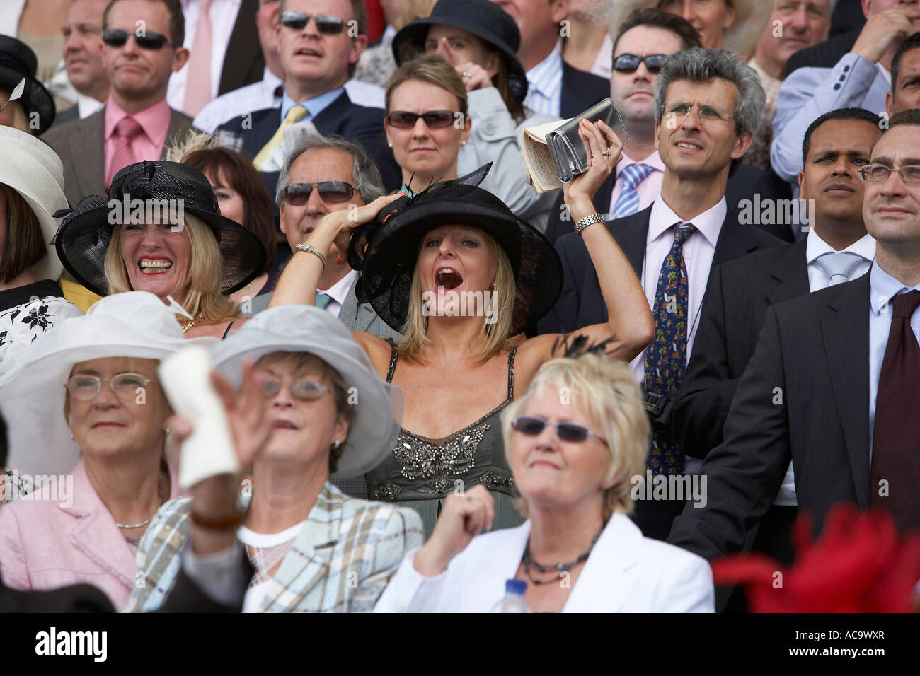 Girls having fun at Royal Ascot backing winners Stock Photo - Alamy