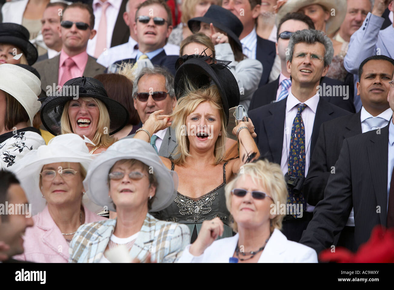 Girls having fun at Royal Ascot backing winners Stock Photo - Alamy