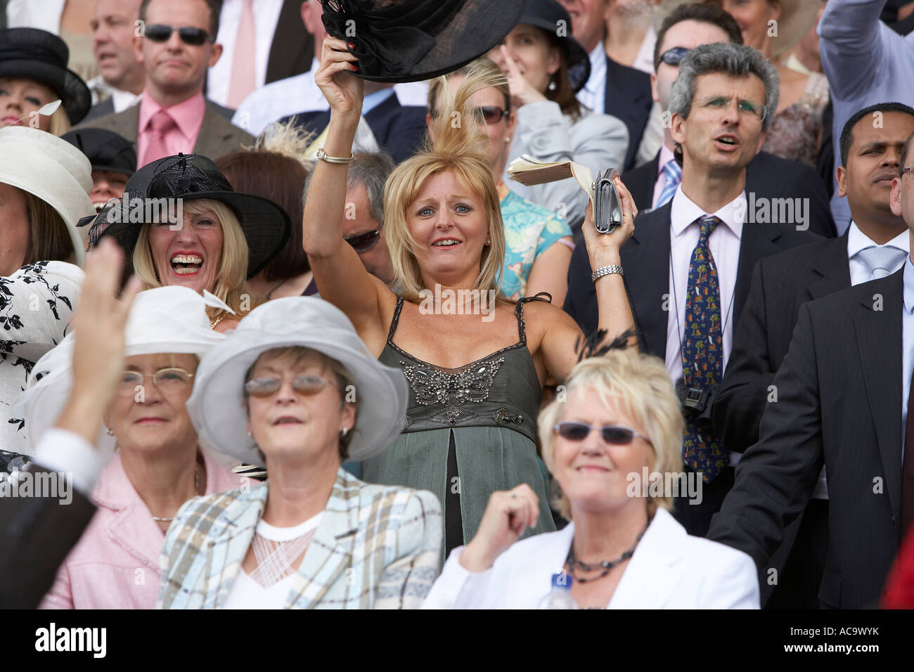 Girls having fun at Royal Ascot backing winners Stock Photo - Alamy