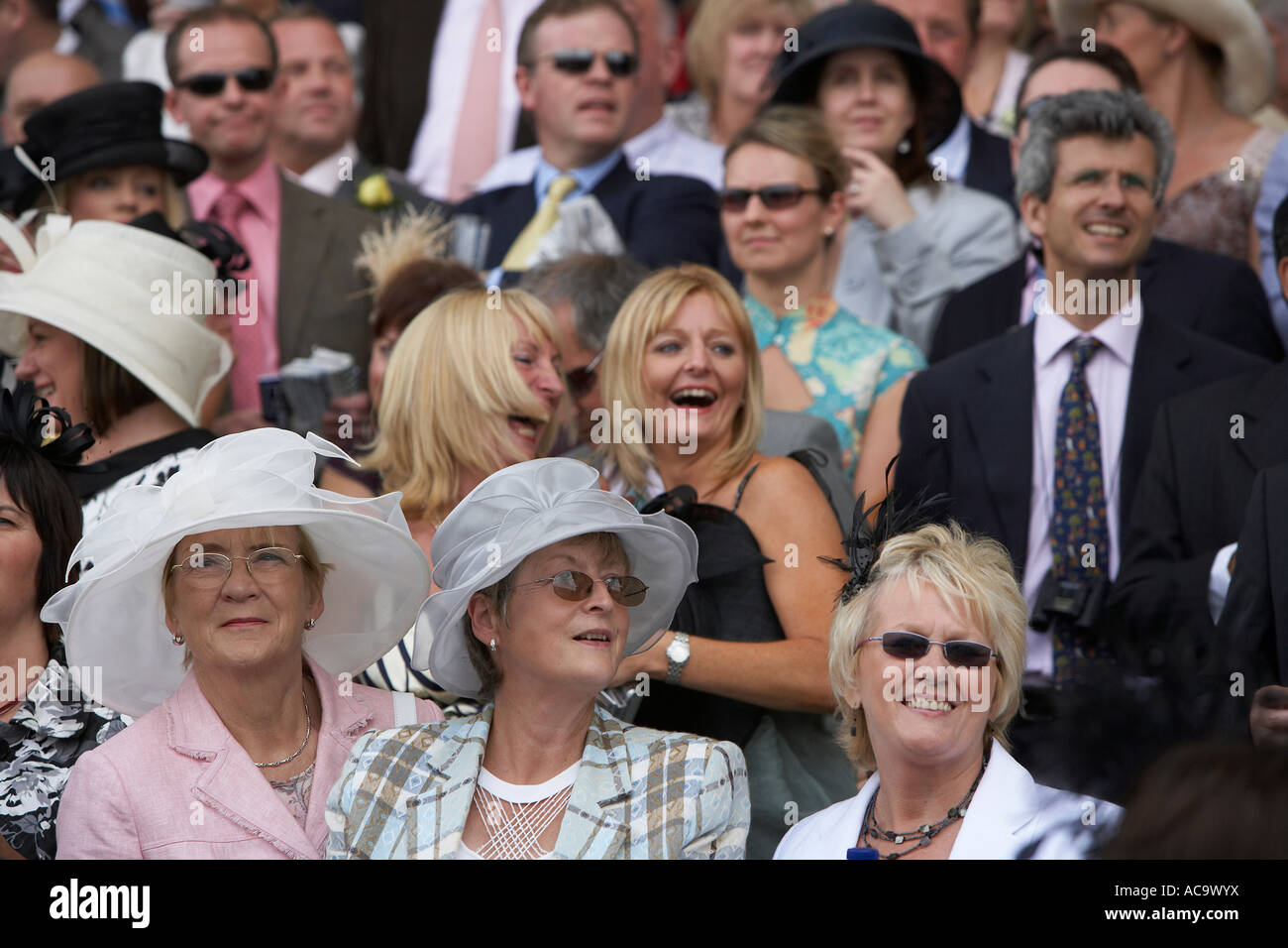Girls having fun at Royal Ascot backing winners Stock Photo - Alamy