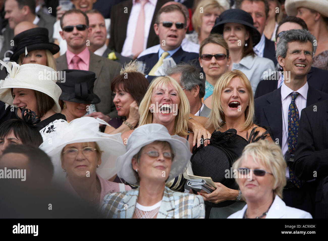 Girls having fun at Royal Ascot backing winners Stock Photo - Alamy