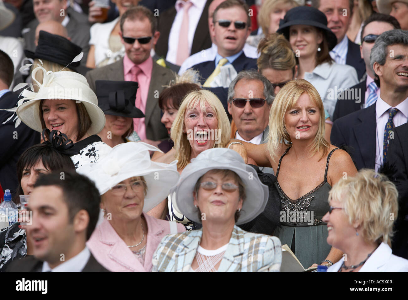 Girls having fun at Royal Ascot backing winners Stock Photo - Alamy