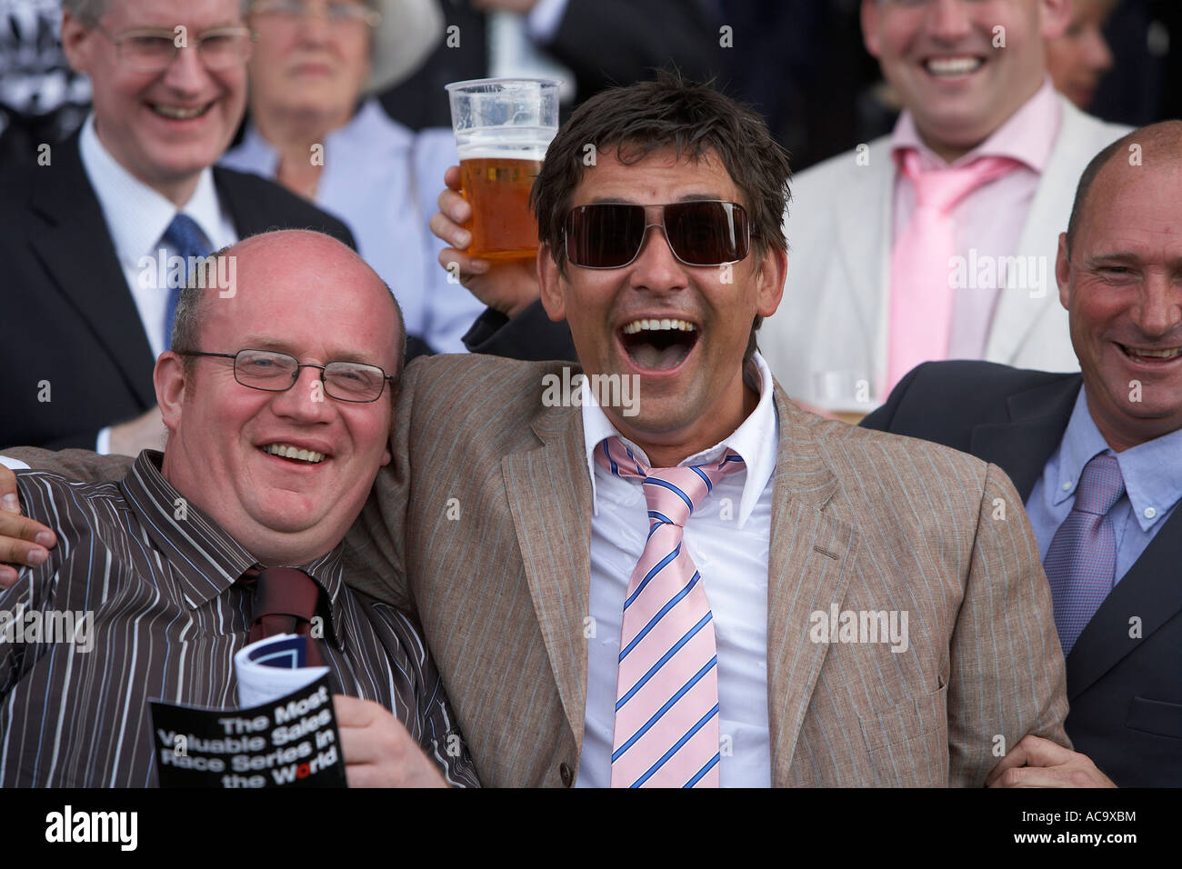 Boys having fun at the races Stock Photo - Alamy