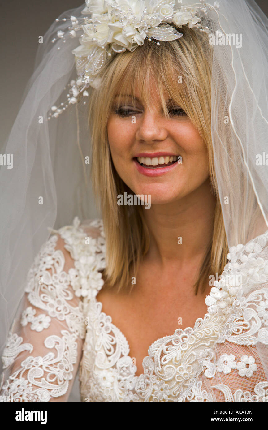 A happy bride models on her wedding day Model released MR Stock Photo ...