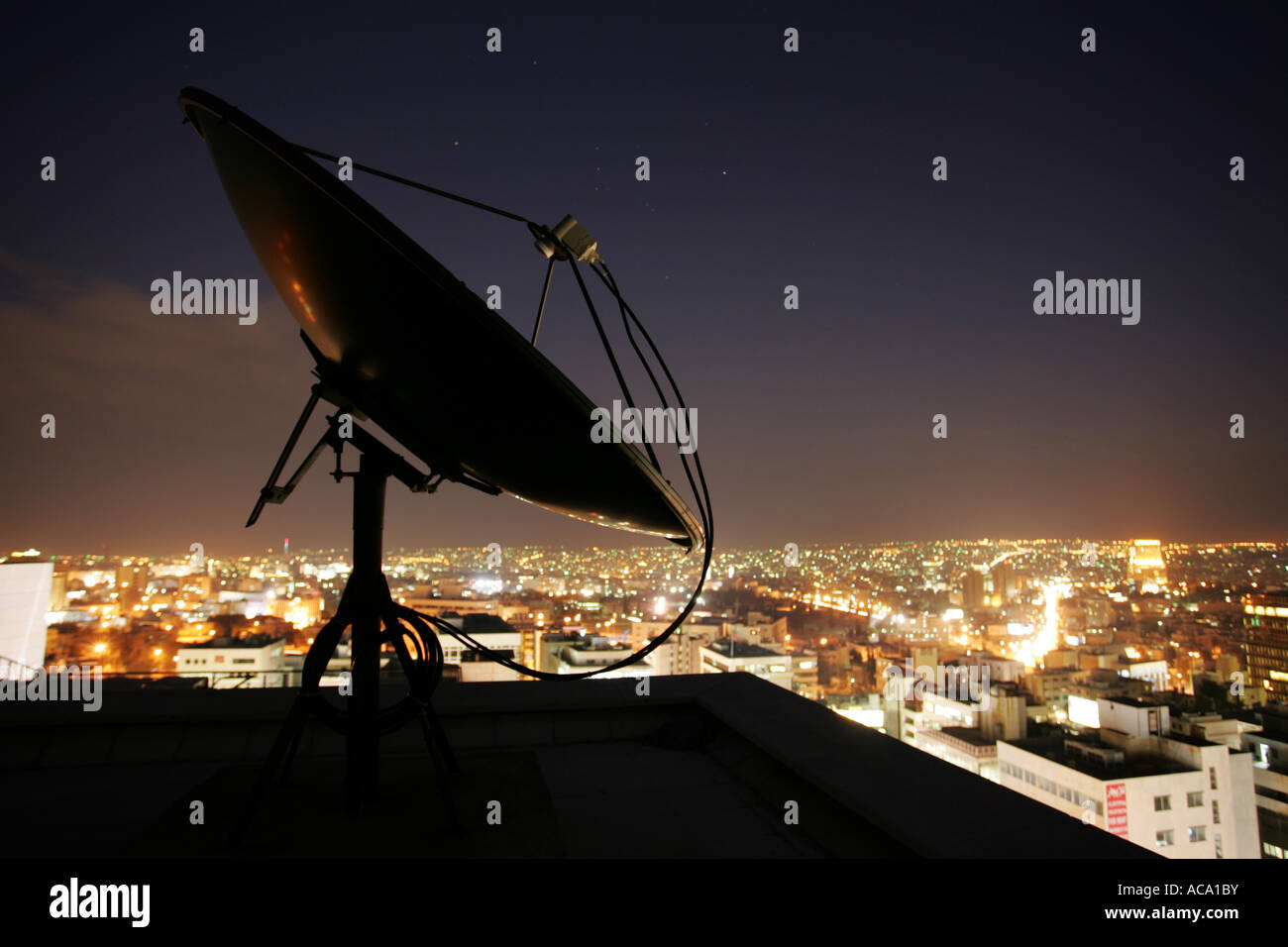 Satellite dishes on the roof of a high rise building Stock Photo - Alamy