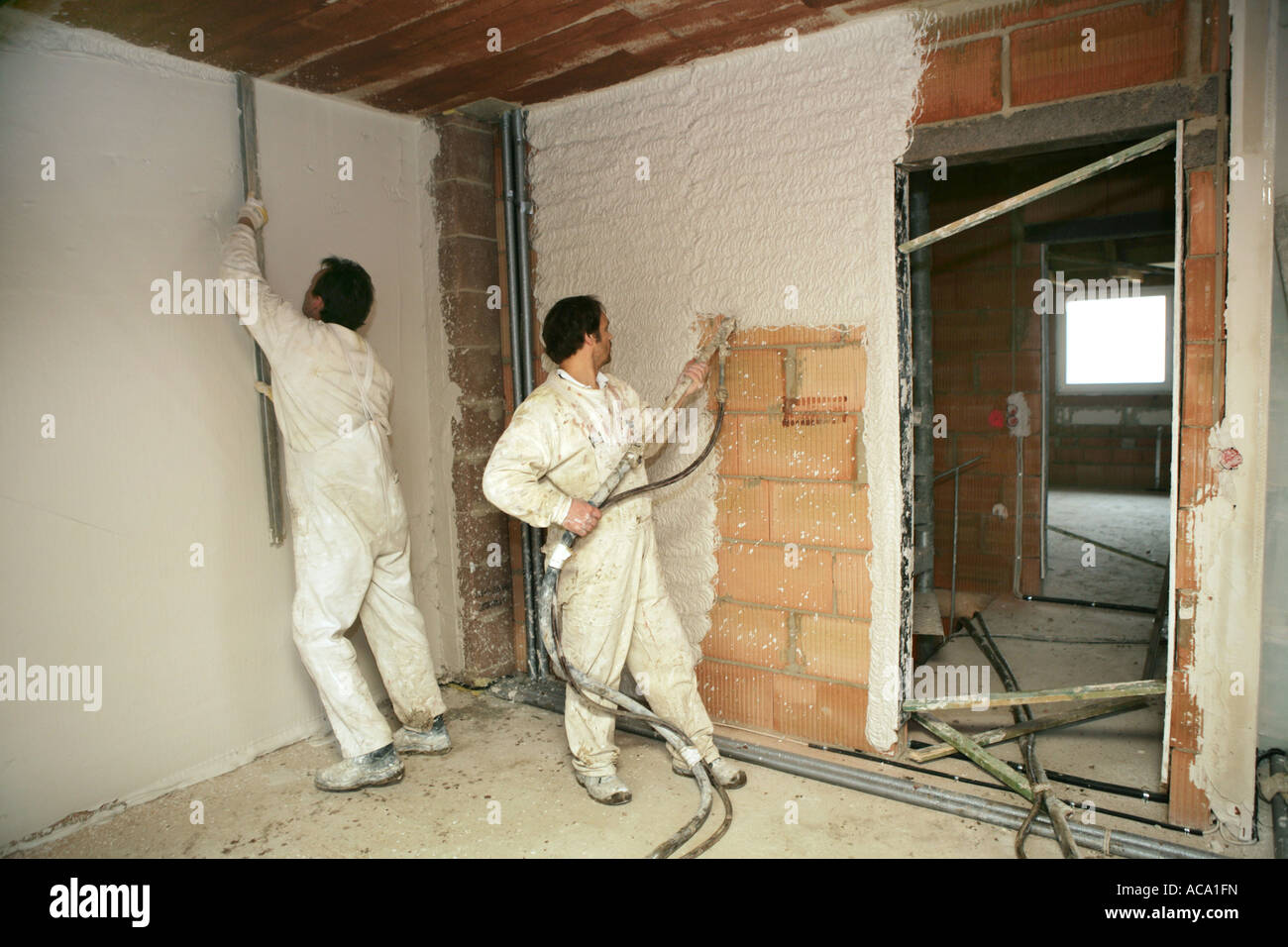 Plasterer at work Stock Photo - Alamy